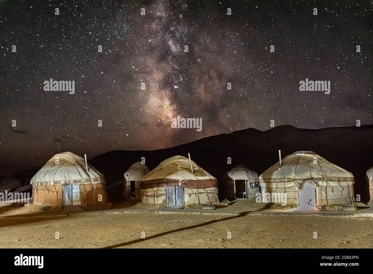 Amazing milky way and starry night over a yurt camp in the Aral Lake ...