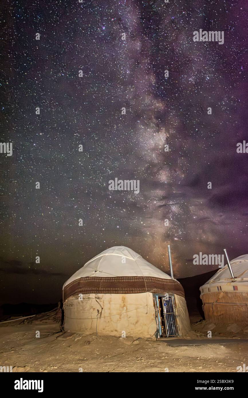 Amazing milky way and starry night over a yurt camp in the Aral Lake ...