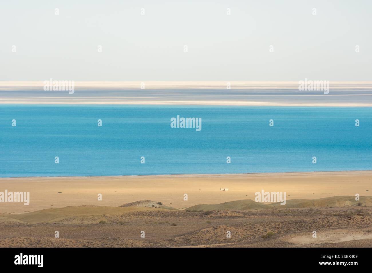 Layers of desert, salt marsh and water of the Aral Lake, Uzbekistan ...