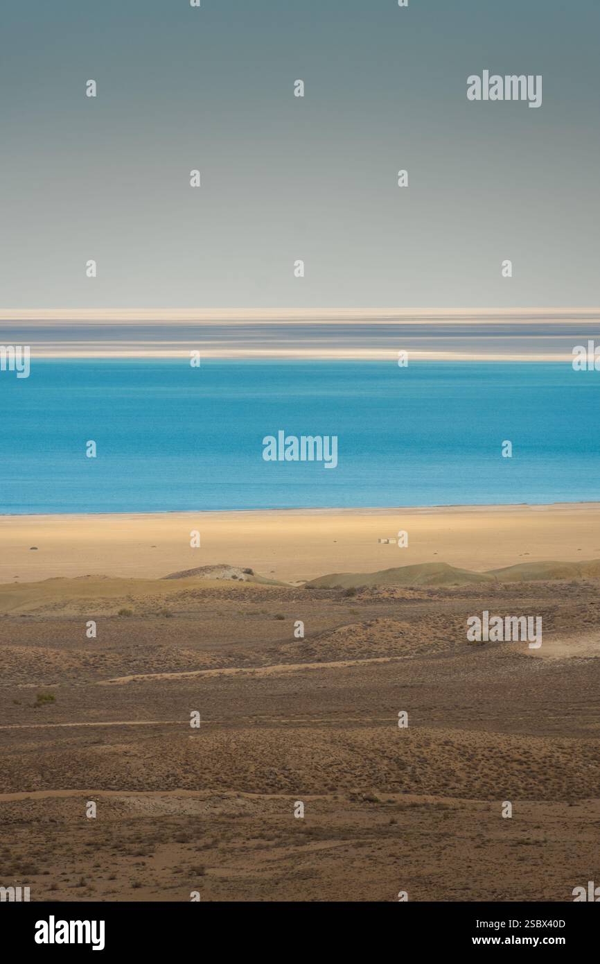 Layers of desert, salt marsh and water of the Aral Lake, Uzbekistan ...