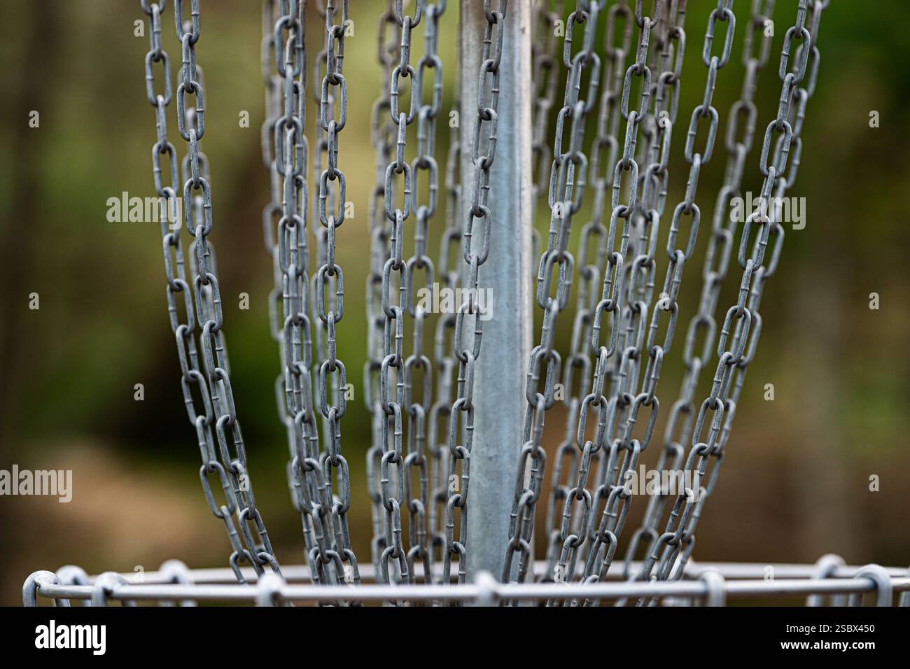 Chains of a disc golf target Stock Photo - Alamy