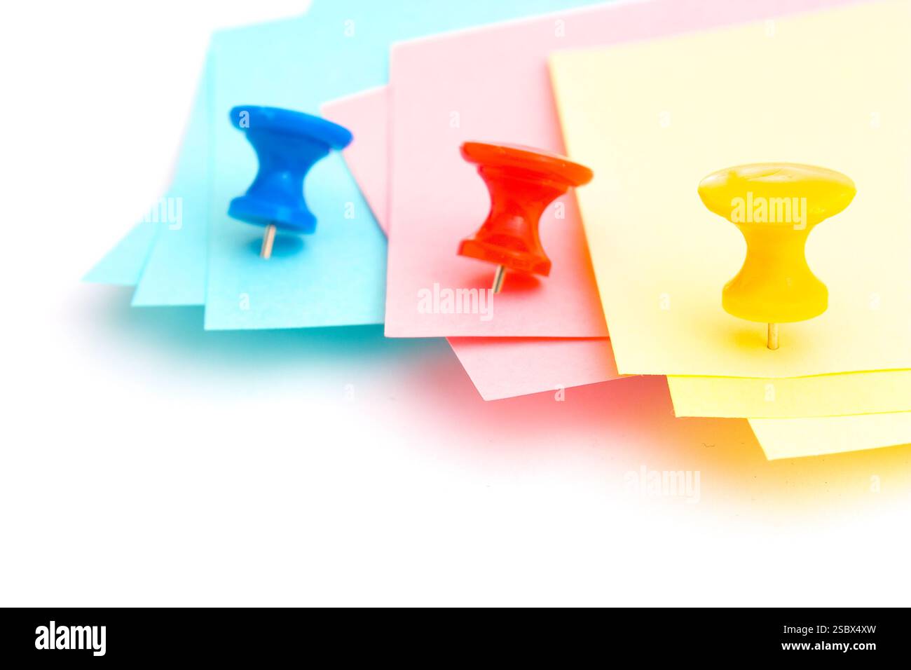 sheets pinned buttons isolated on white background Stock Photo - Alamy