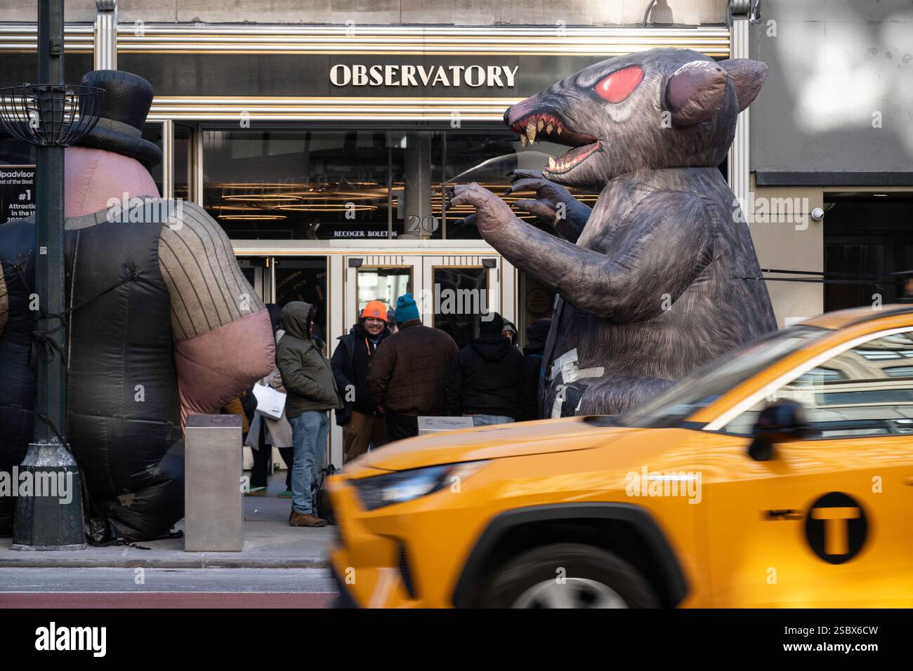 Scabby, a giant inflatable rat at a union protest site at the Empire ...
