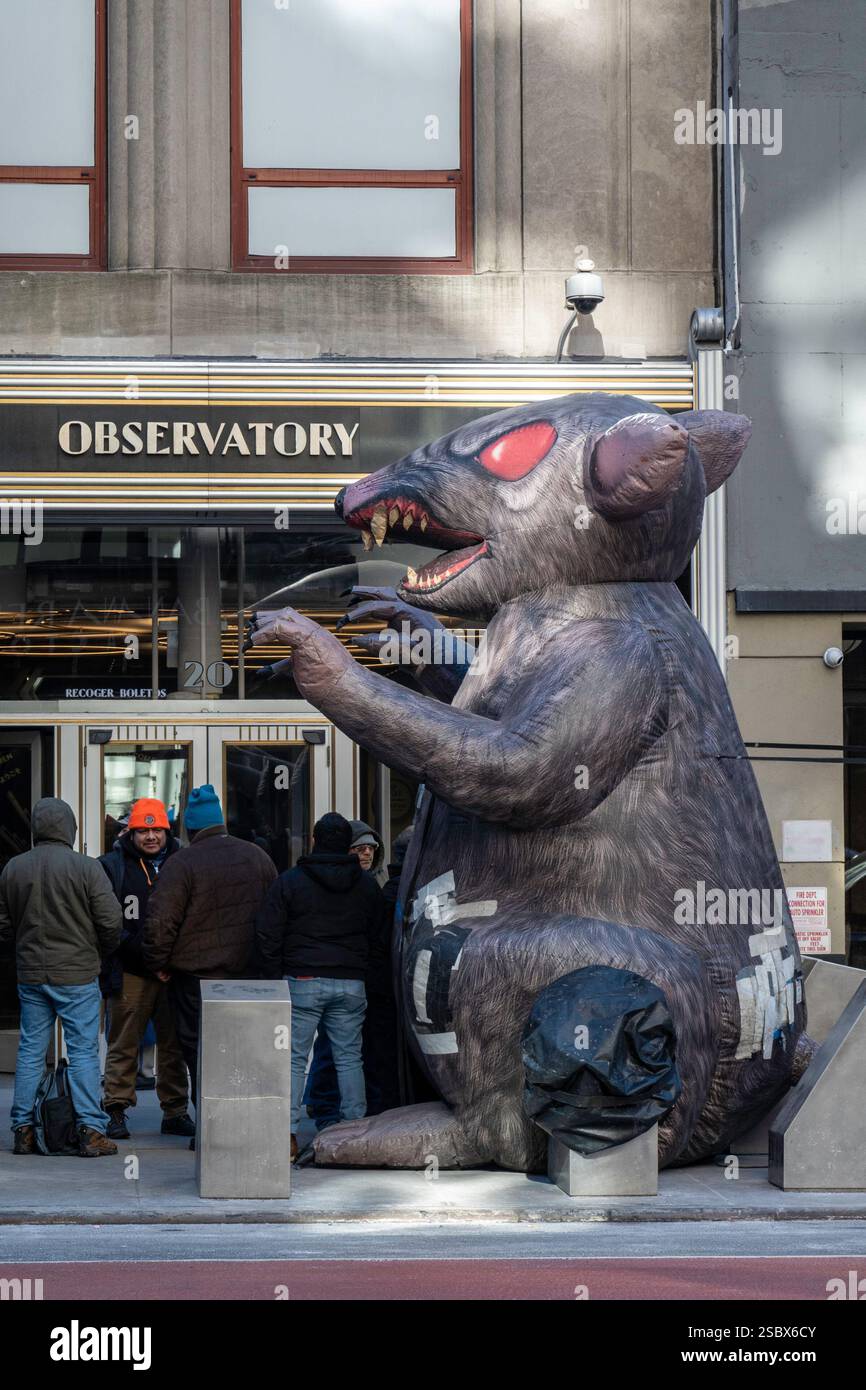 Scabby, a giant inflatable rat at a union protest site at the Empire ...