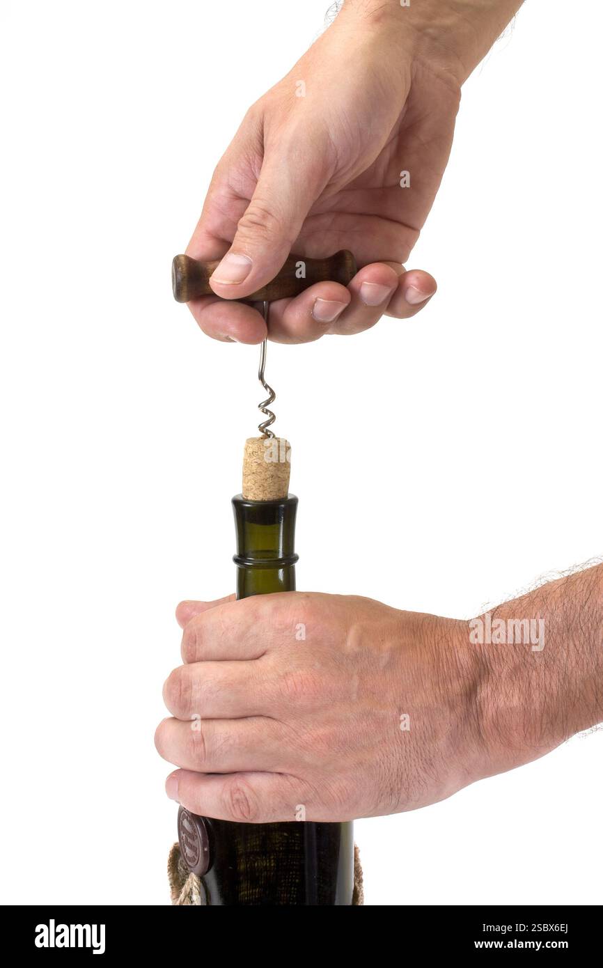 pulling corkscrew cork from the bottle isolated on white background ...
