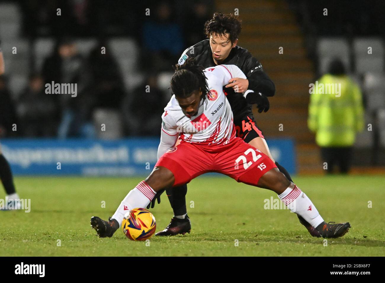 Daniel Phillips (22 Stevenage) challenged by Tomoki Iwata (24 ...