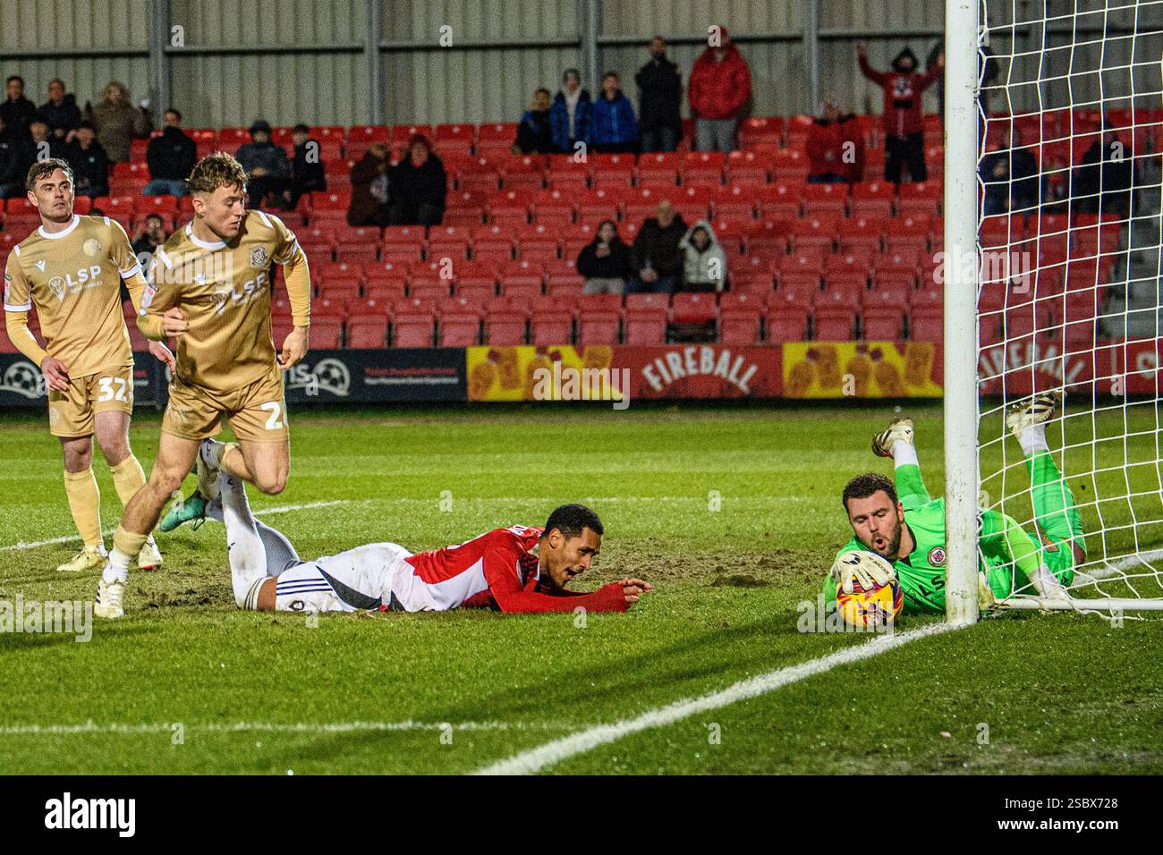 Grant Smith of Bromley FC saves just in front of the goal line during ...