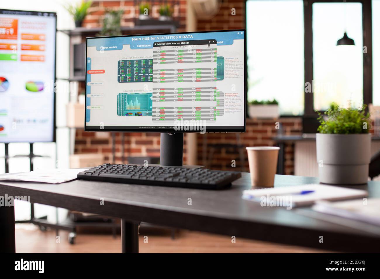 Empty workspace with desktop pc and big digital screen desk displaying business analytics data ...