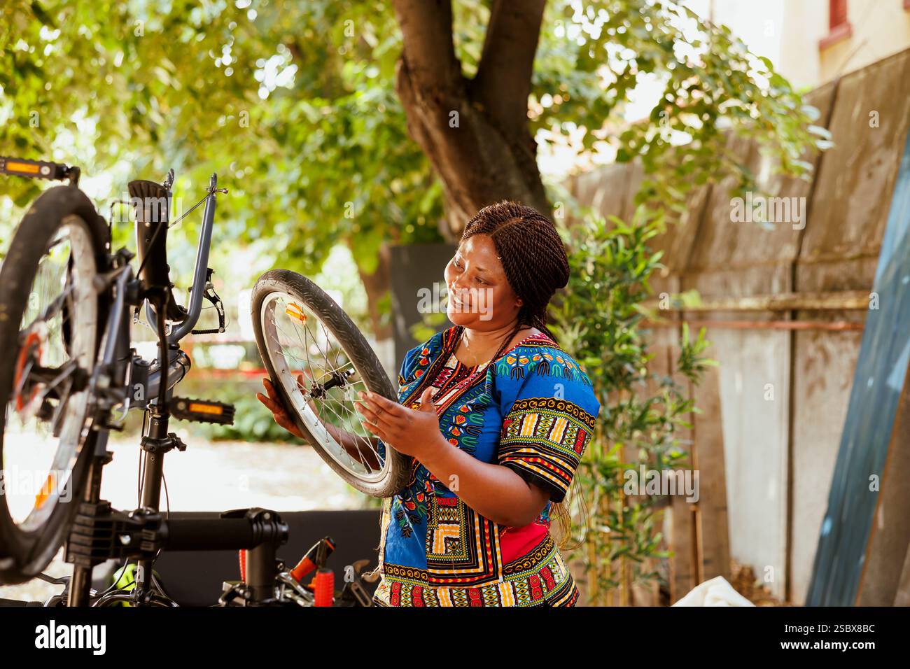 Image showing enthusiastic sporty african american woman gripping and ...