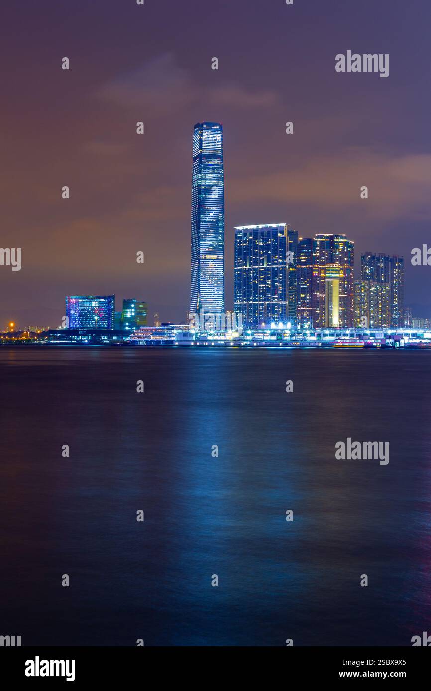 Nightfall on Victoria Harbour and the skyline of Kowloon Island in Hong ...