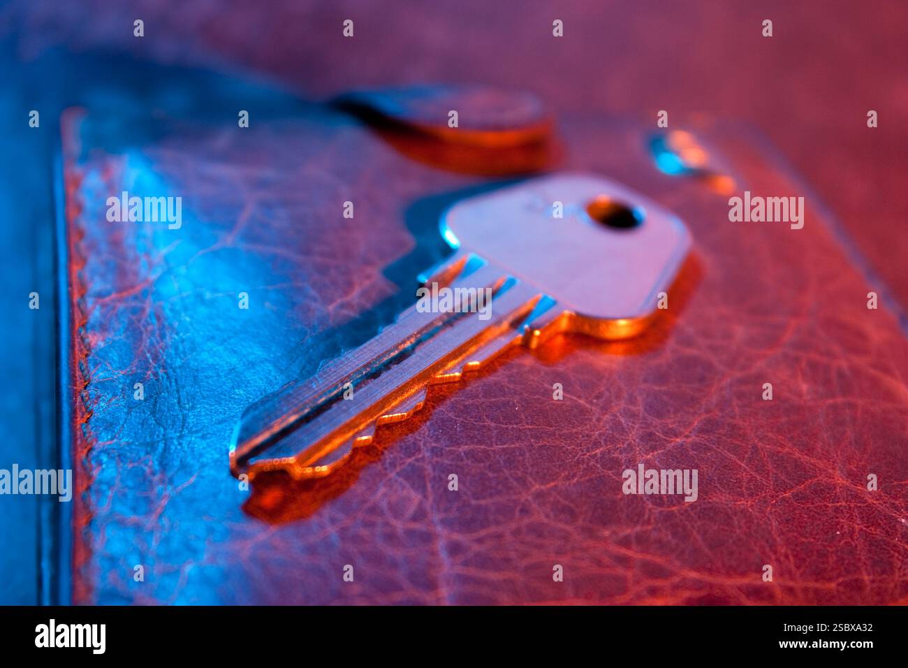 The key to the lock in the color light Stock Photo - Alamy