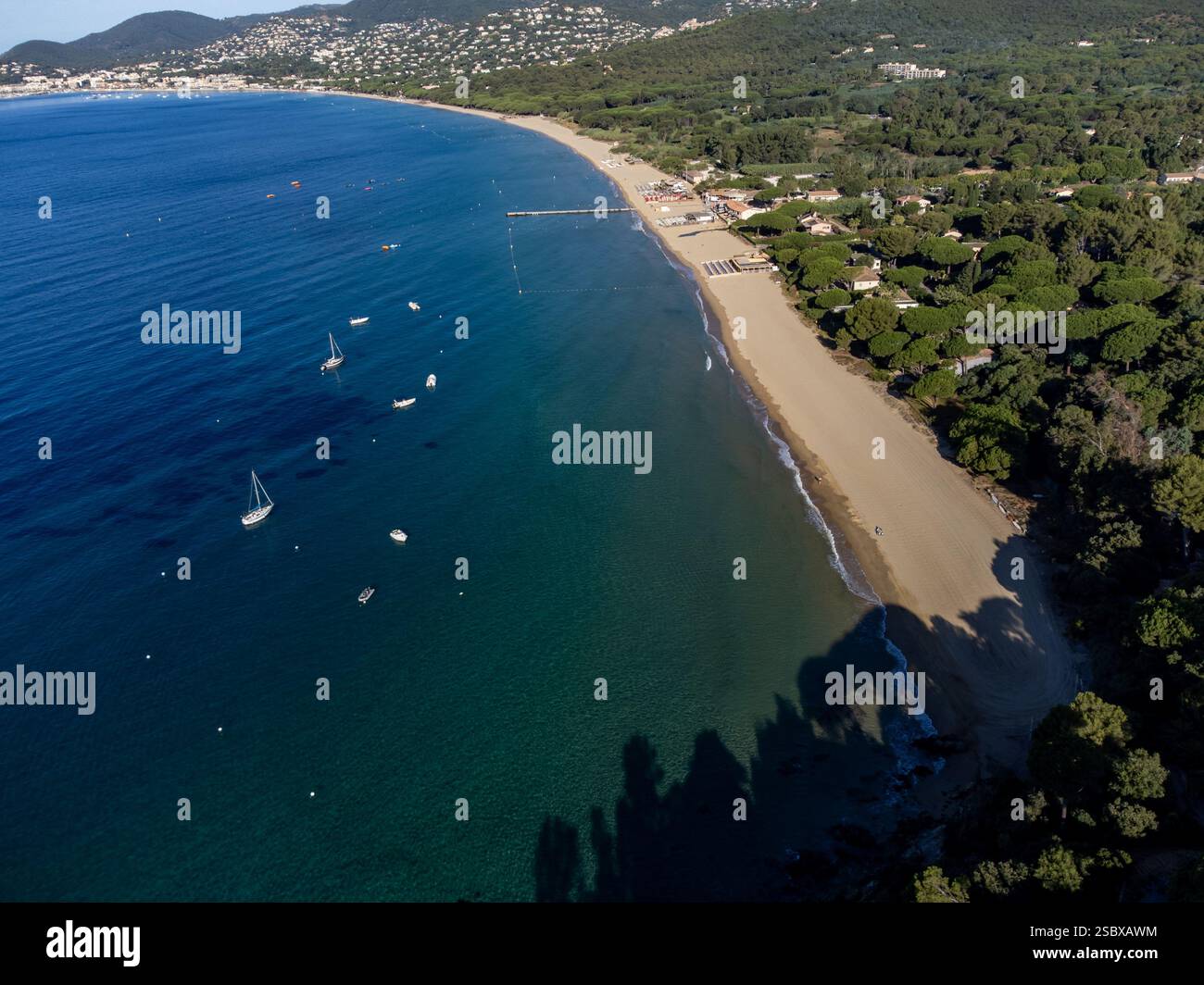 Aerial view on boats, crystal clear blue water of Plage du Debarquement ...
