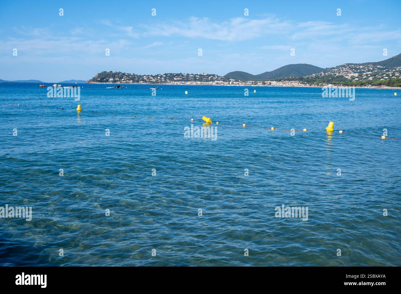 Morning view on crystal clear blue water and pier of Plage du ...