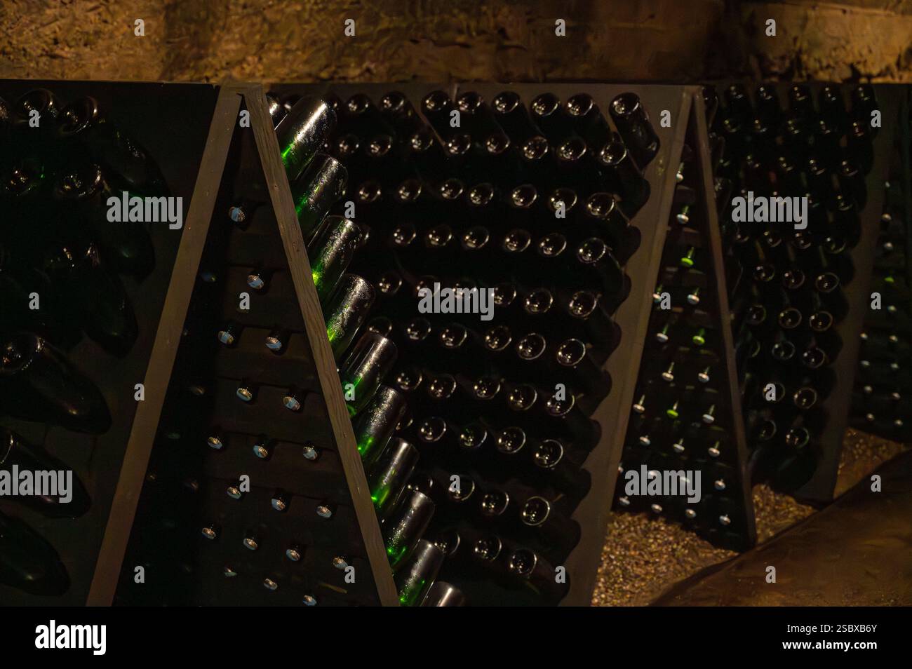 Riddling manual process in caves, wooden pupitres, traditional method ...