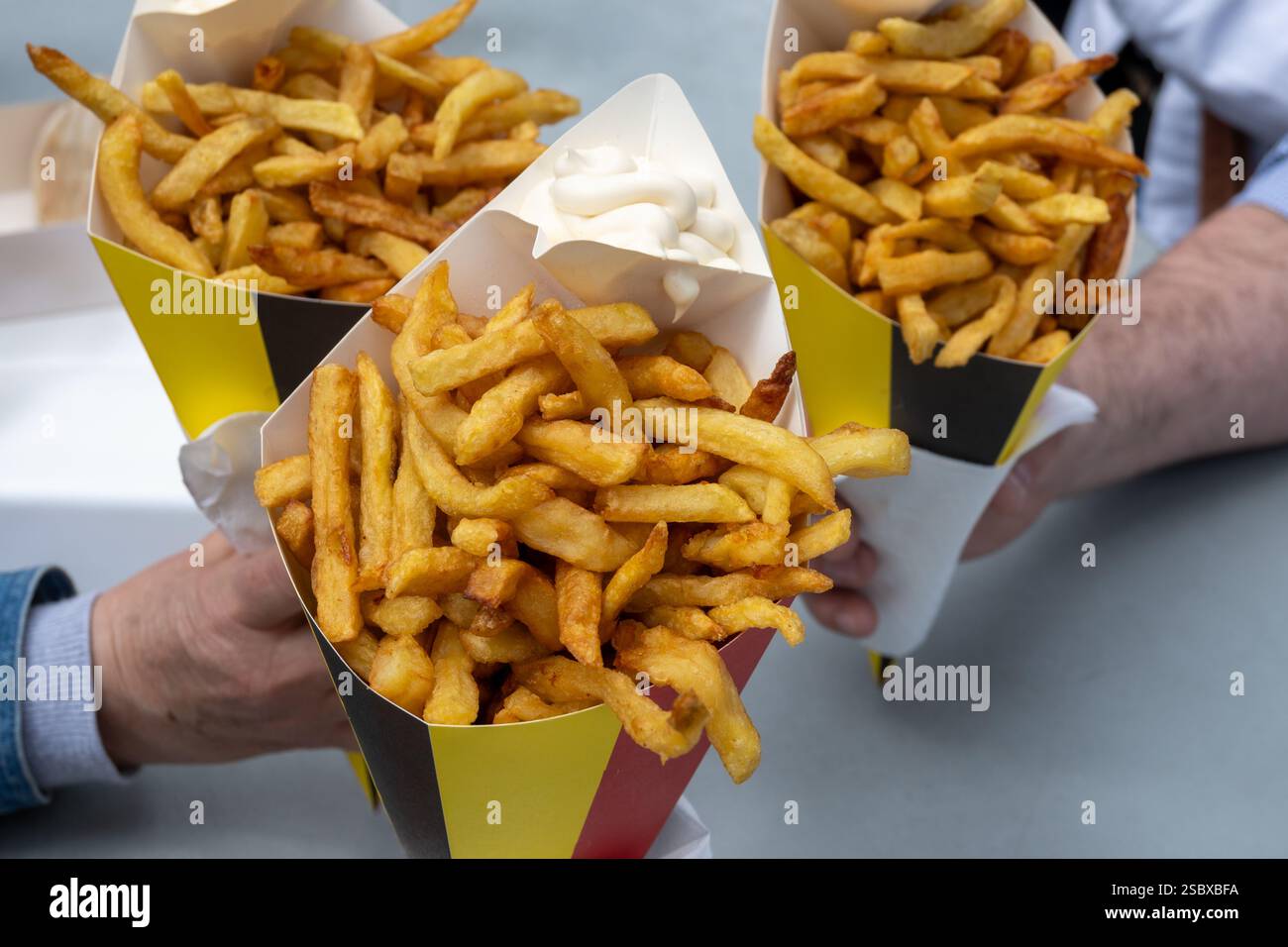 Belgian street and fast food, paper cone bag in colors of Belgian flag ...