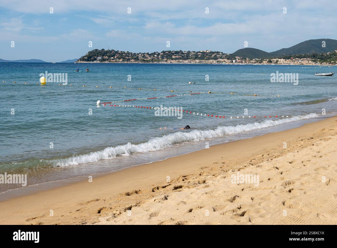 Morning view on crystal clear blue water and boats on Plage du ...