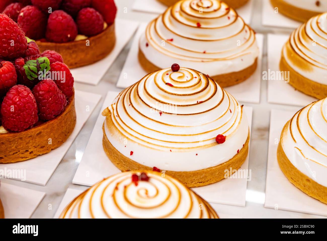 Sweet dessert fresh baked meringue cakes in bakery shop Stock Photo - Alamy