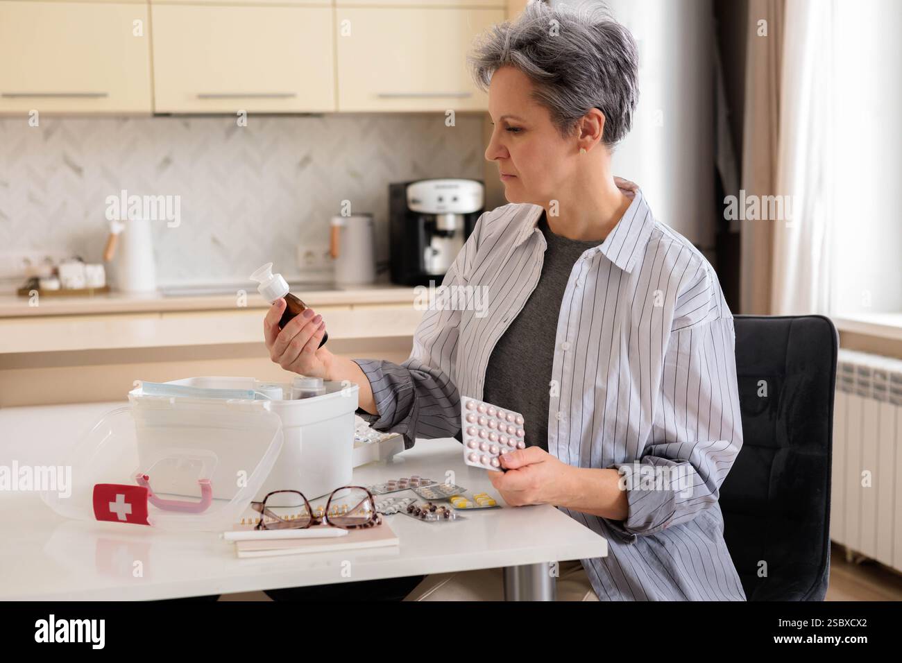Beautiful, well-groomed and aged woman pensioner aged with gray hair ...