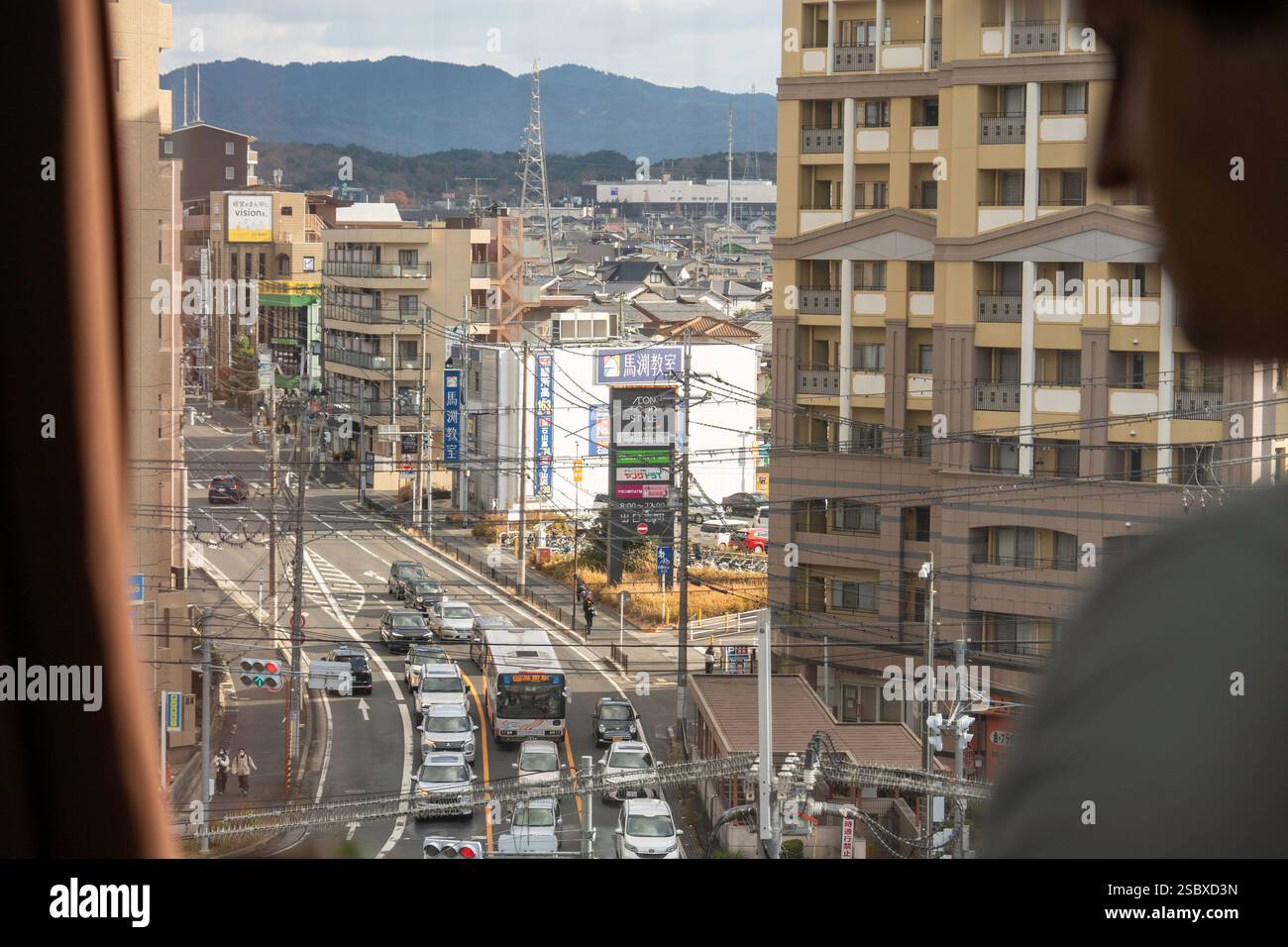 Kyoto, Japan - Dec 27 2024: a city street view from a window in Japan ...