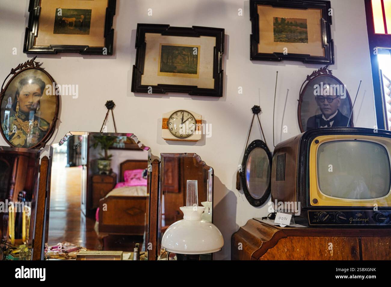 Antique clocks and vintage TV sets on display at the Pinang Peranakan ...