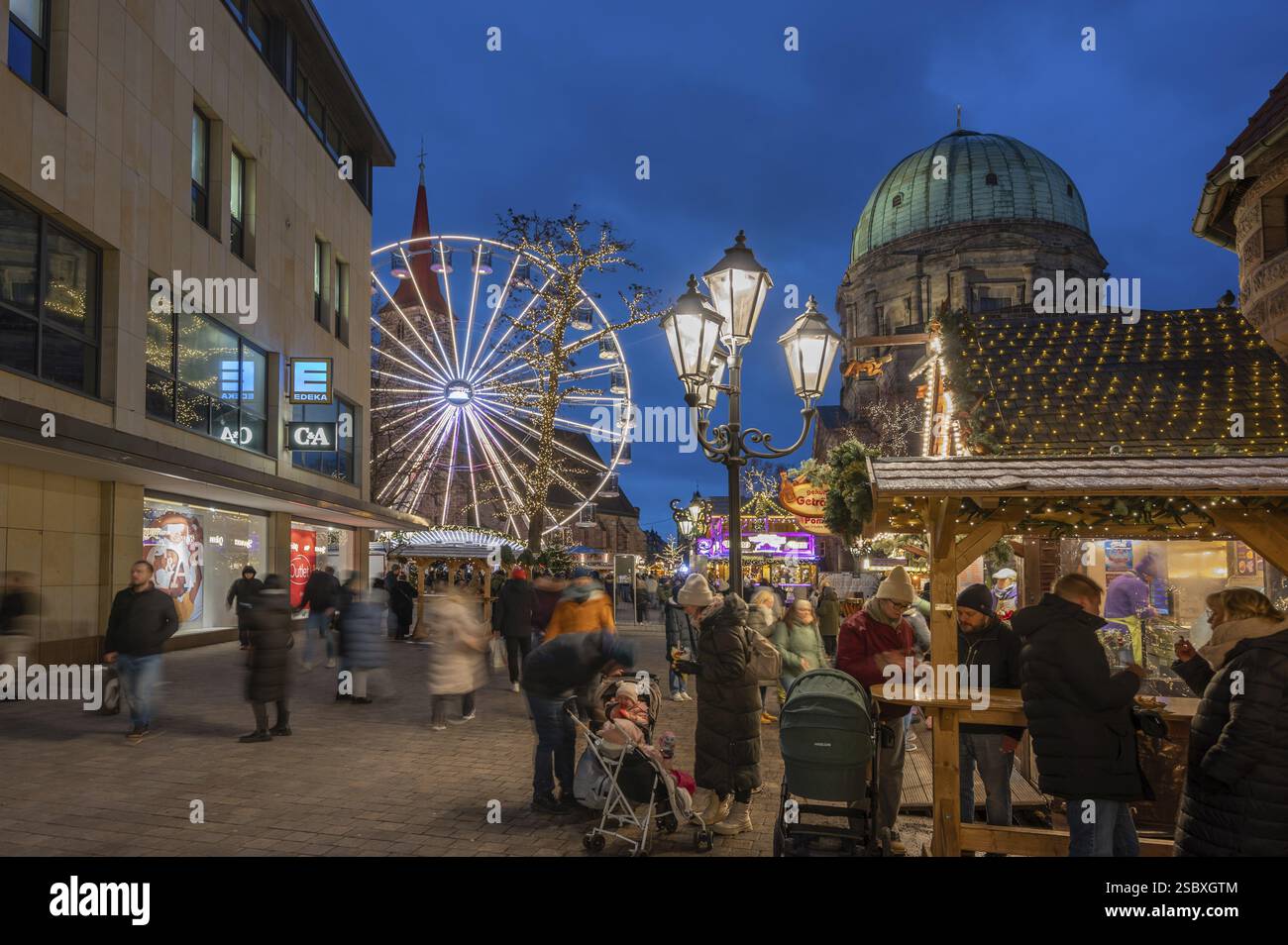 Ferris wheel at the winter village, Christmas market at dusk, St James ...