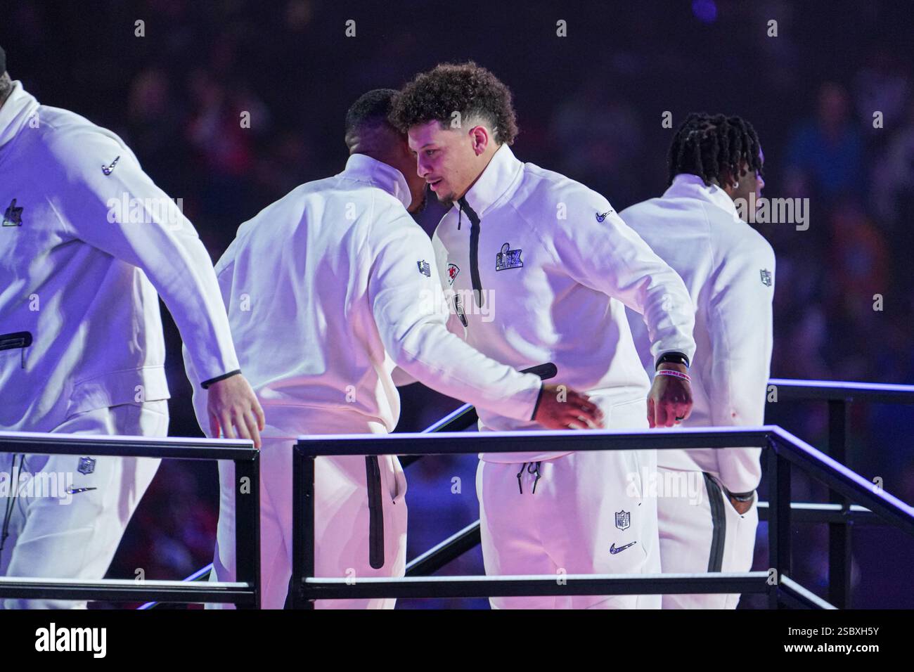 Quarterbacks Jalen Hurts (left) and Patrick Mahomes sharing a hug ...