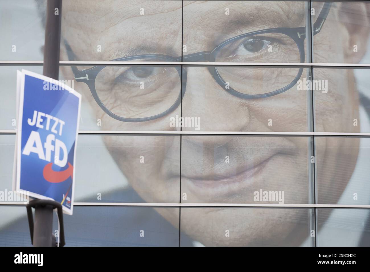 An election poster of the far-right AfD party (now AfD) hangs in front ...