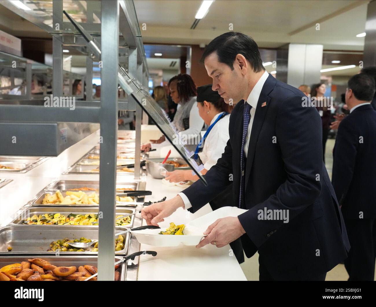 Secretary Marco Rubio gets a tour of the cafeteria at the Department of ...