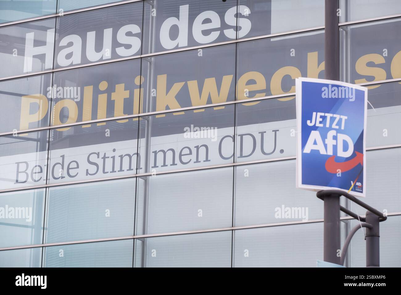 An election poster for the far-right AfD party (now AfD) hangs in front ...
