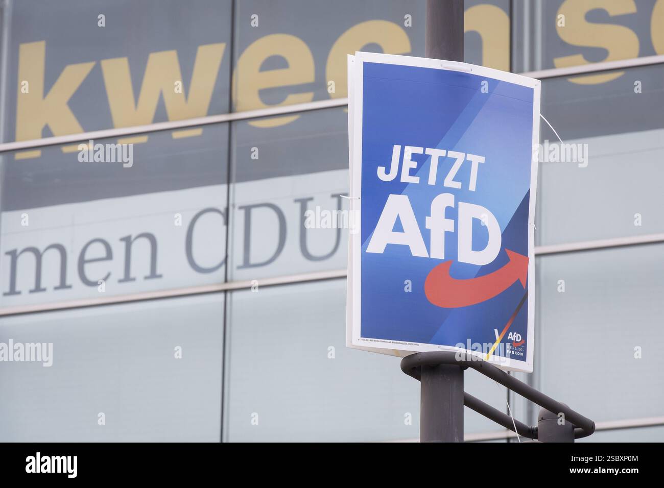 An election poster for the far-right AfD party (now AfD) hangs in front ...