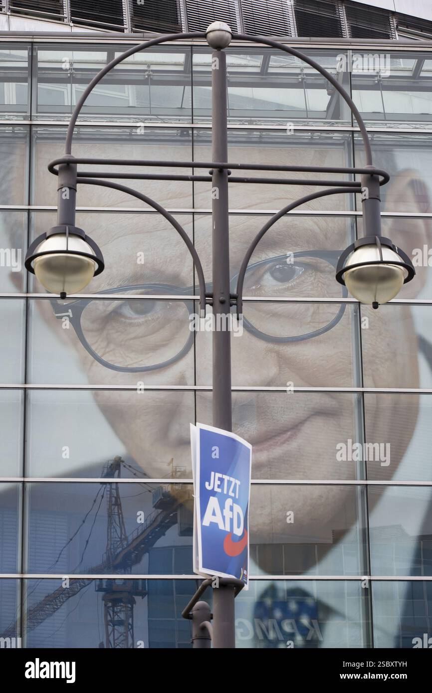 An election poster of the far-right AfD party (now AfD) hangs in front ...