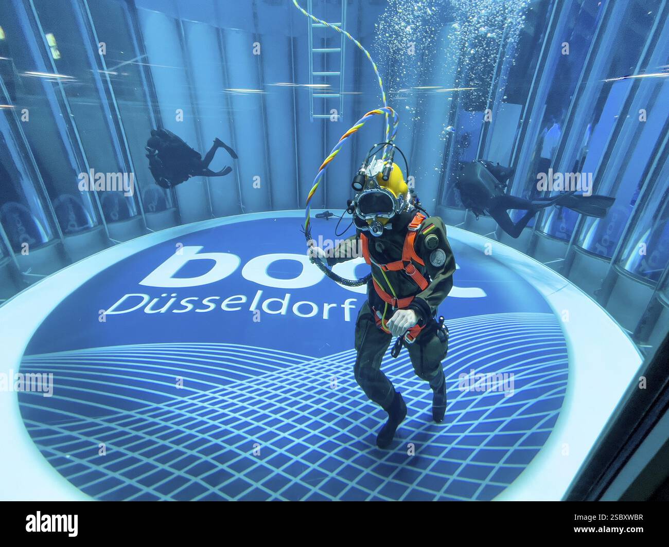 Diver helmet diver from the German Navy with hose for air supply from ...