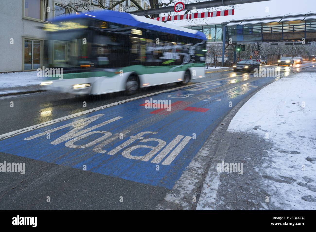 Moving city bus in an emergency lane near the University Hospital ...