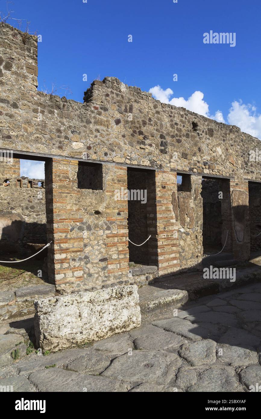 Doorways in old residential building made of terracotta brick and stone ...