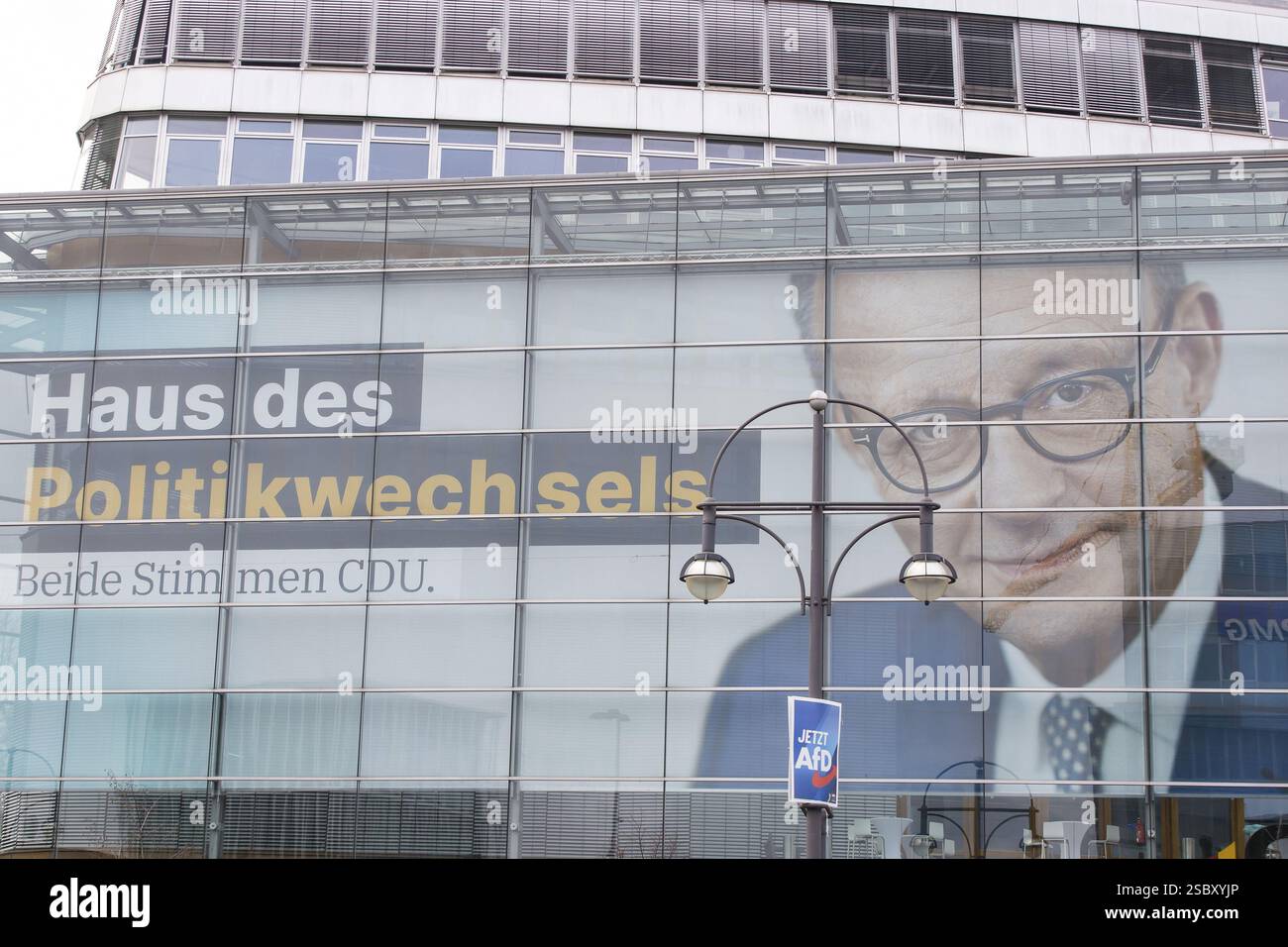 An election poster of the far-right AfD party (now AfD) hangs in front ...