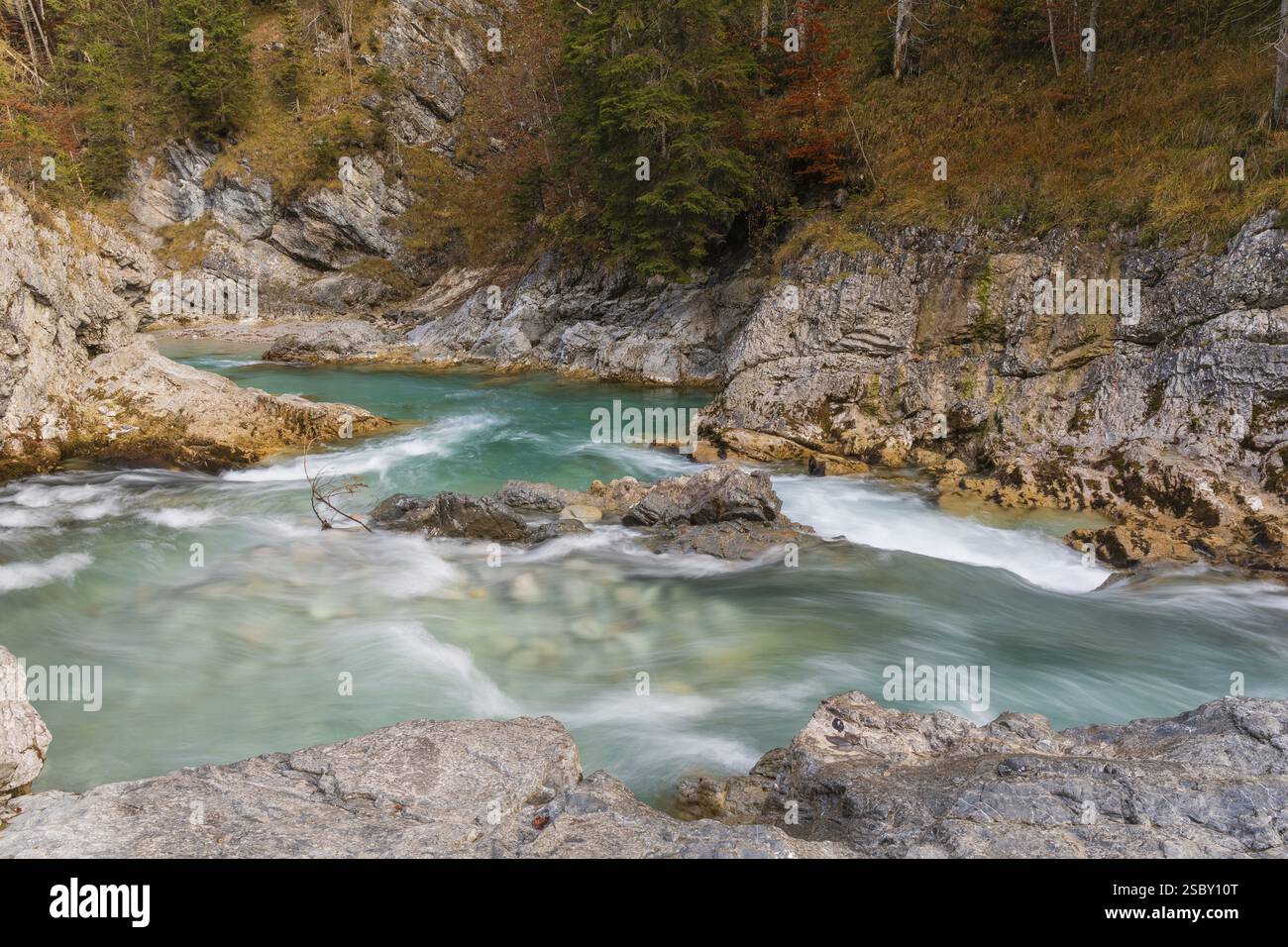 The Riss creek flowing through an autumnal landscape in the Eng valley ...