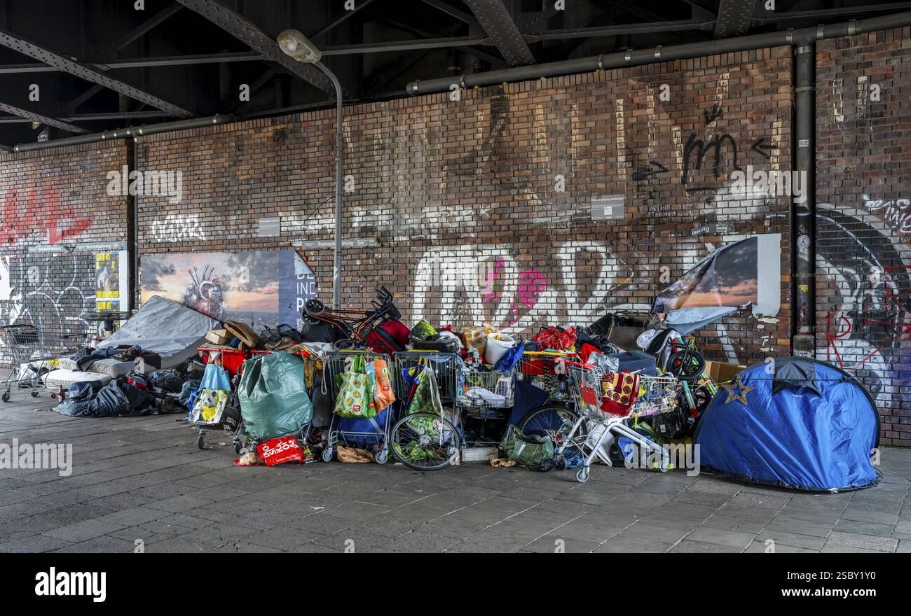 Waste and rubbish collection point, homeless people under the ...