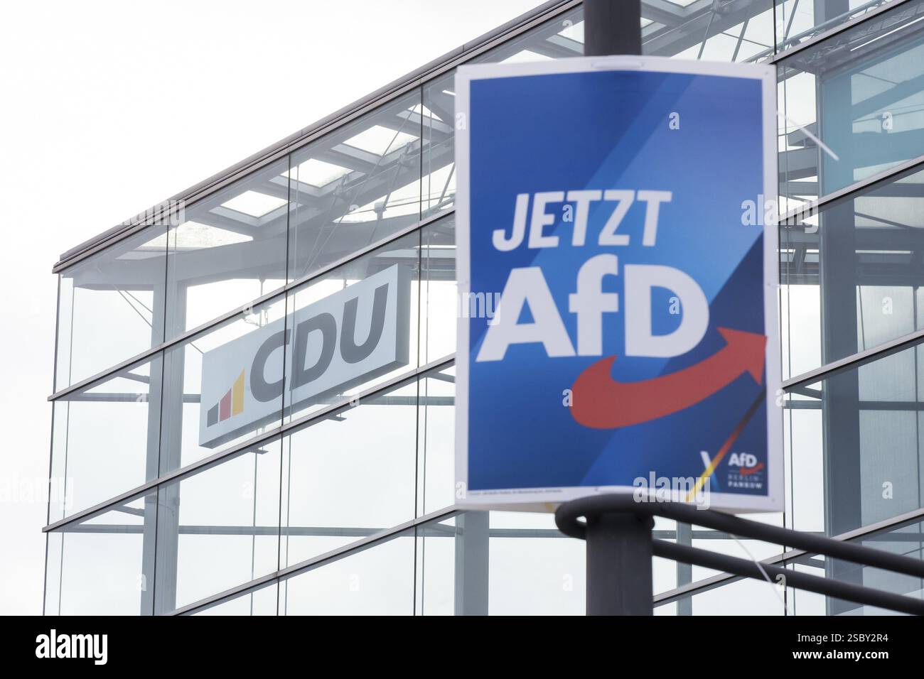 An election poster of the far-right AfD party (now AfD) hangs in front ...