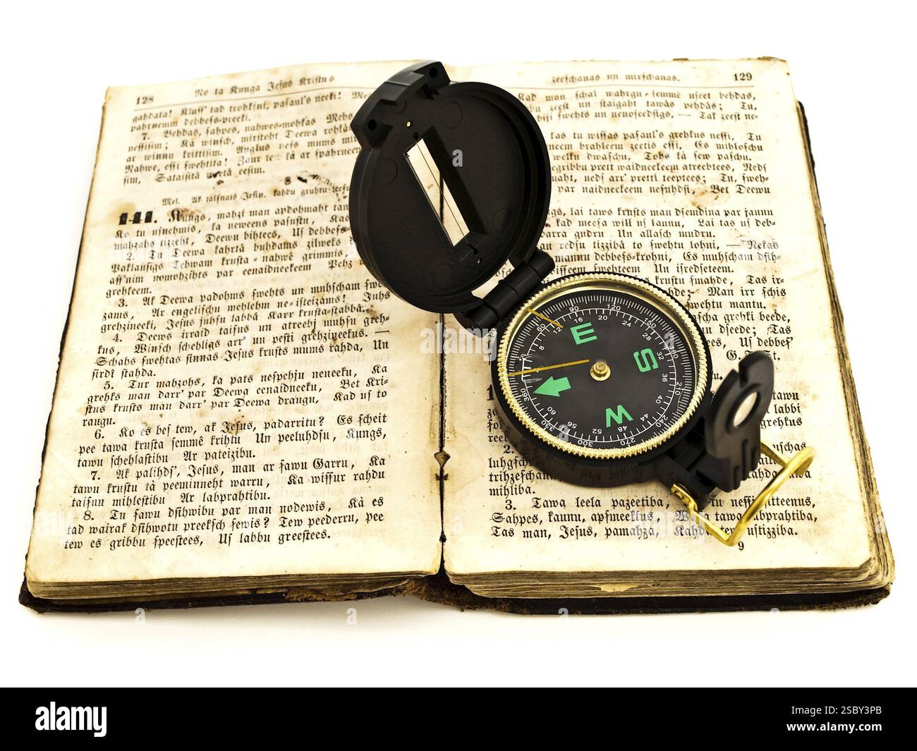Compass At Old Book Against The White Background Stock Photo - Alamy