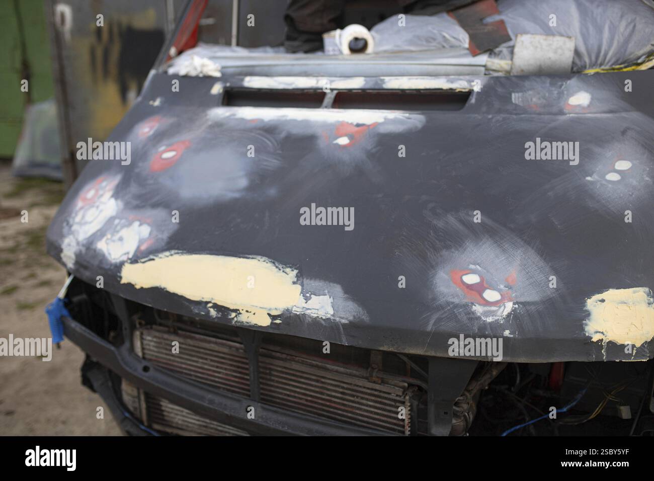 Car hood undergoing repair with visible sanding marks Stock Photo - Alamy