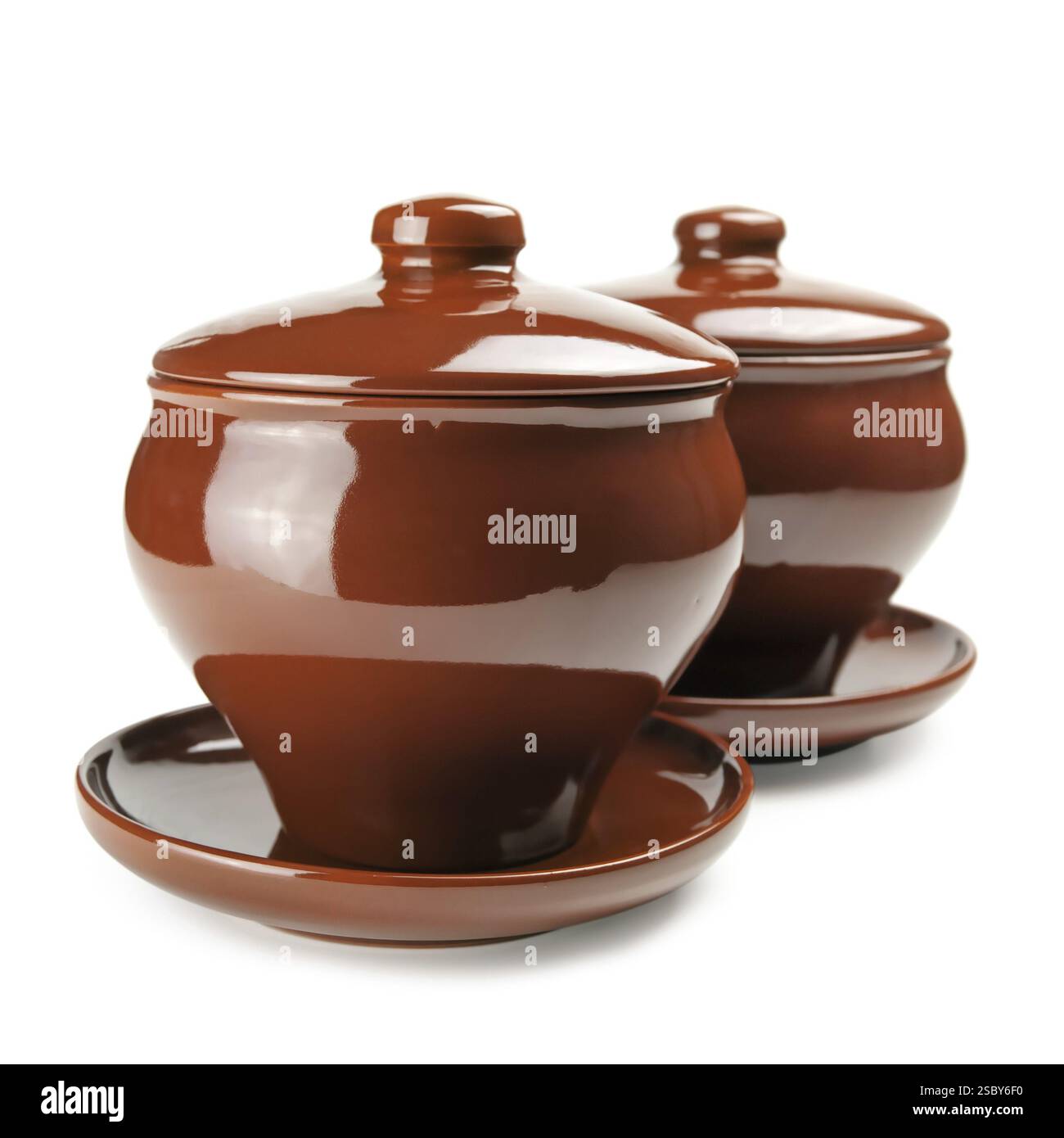 Brown ceramic pot over the white background Stock Photo - Alamy
