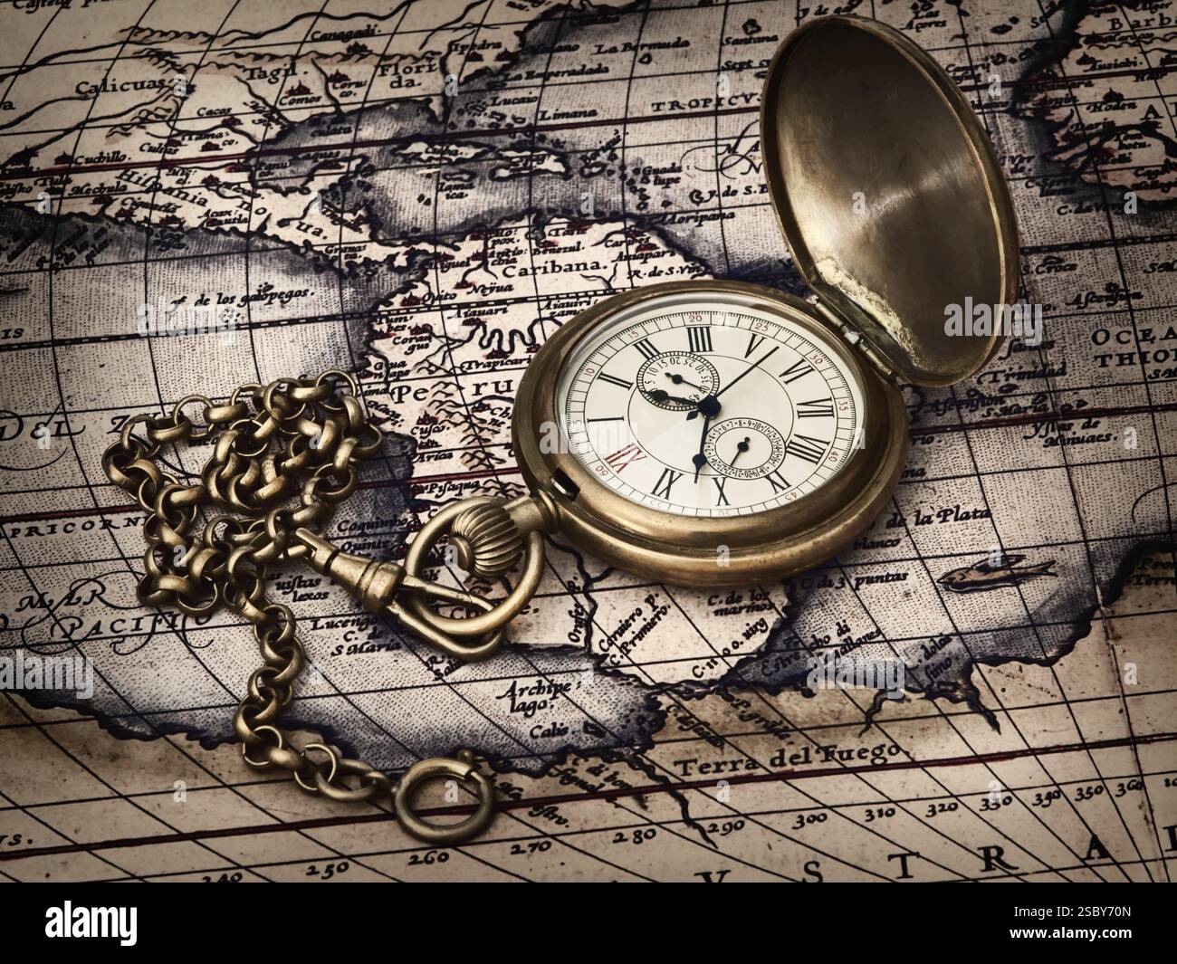 Travelling theme: vintage clock at antique map Stock Photo - Alamy