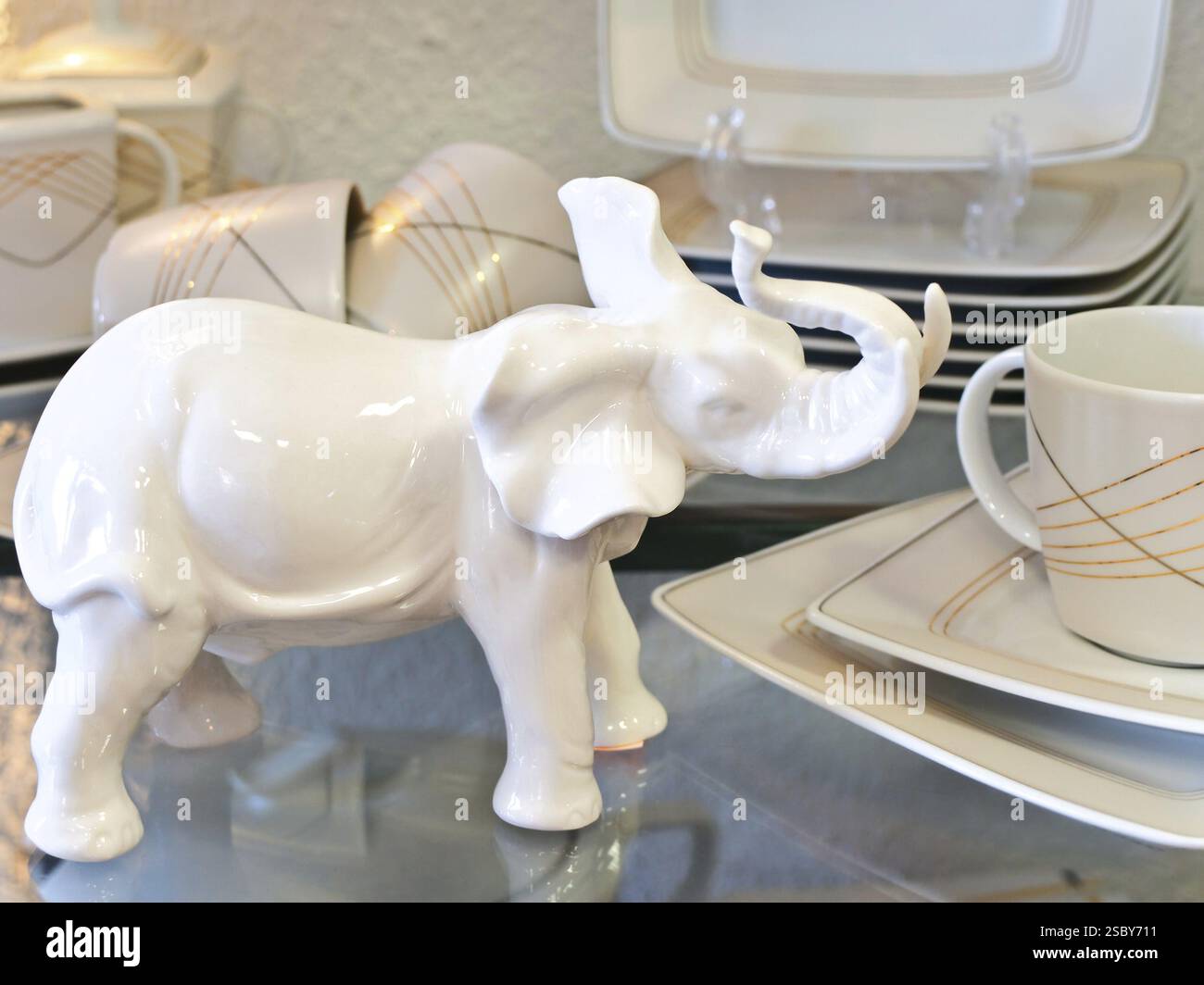 Photo of the porcelain elephant and tea service Stock Photo - Alamy