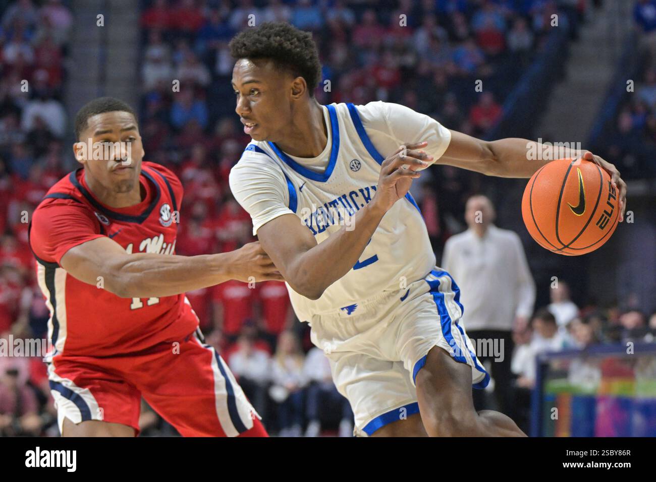 Kentucky guard Jaxson Robinson (2) drives against Mississippi guard ...