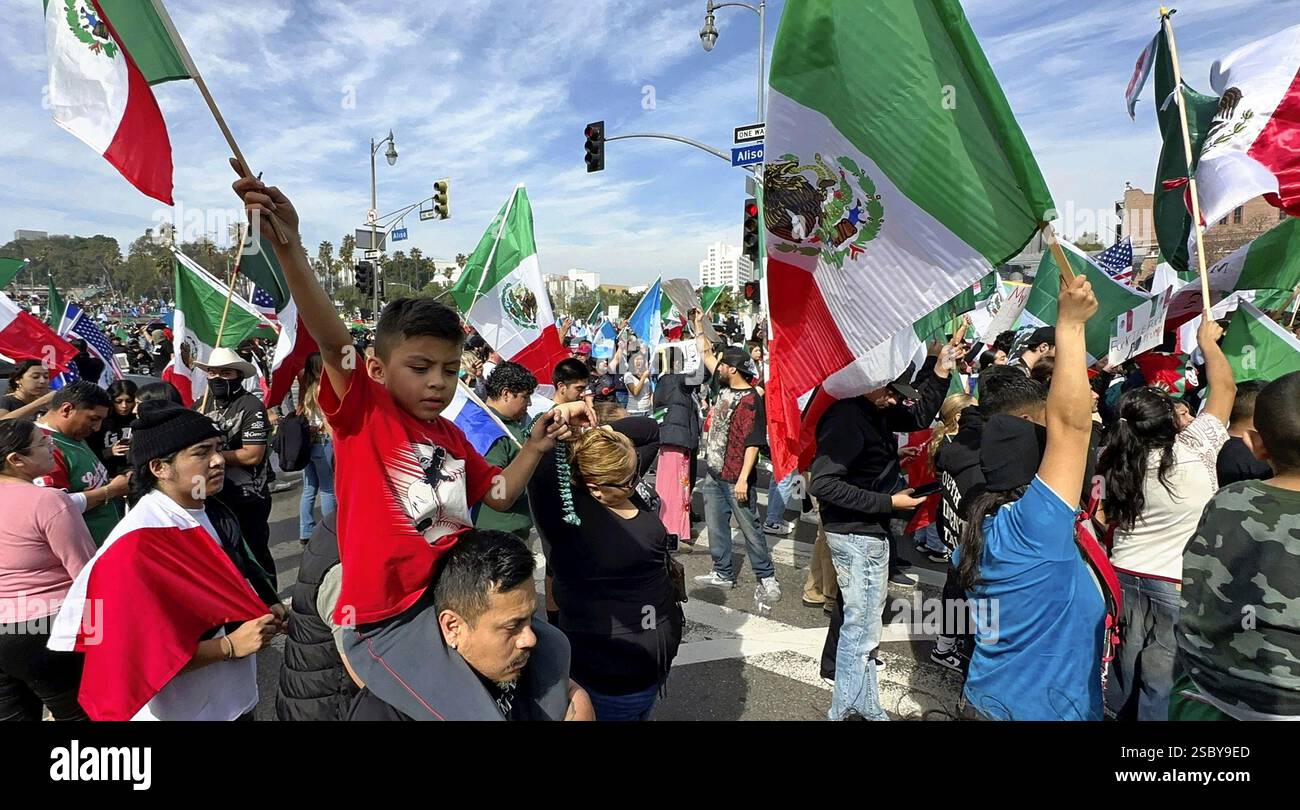 People occupy a road to protest against the Trump administration's ...