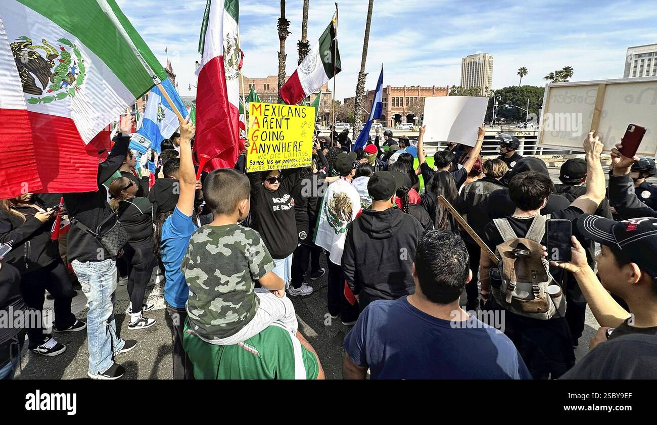 People occupy a road to protest against the Trump administration's ...