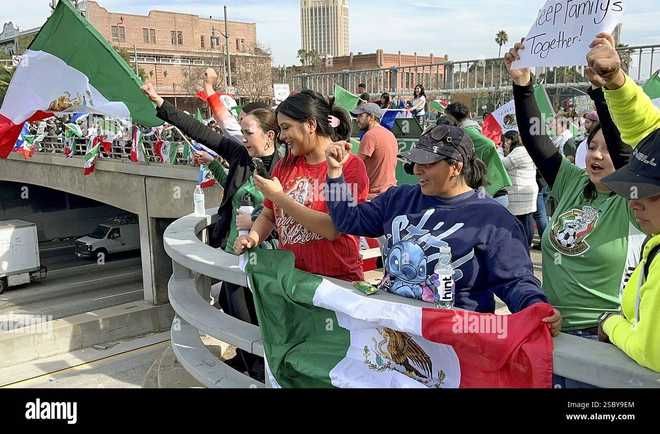 People occupy a road to protest against the Trump administration's ...