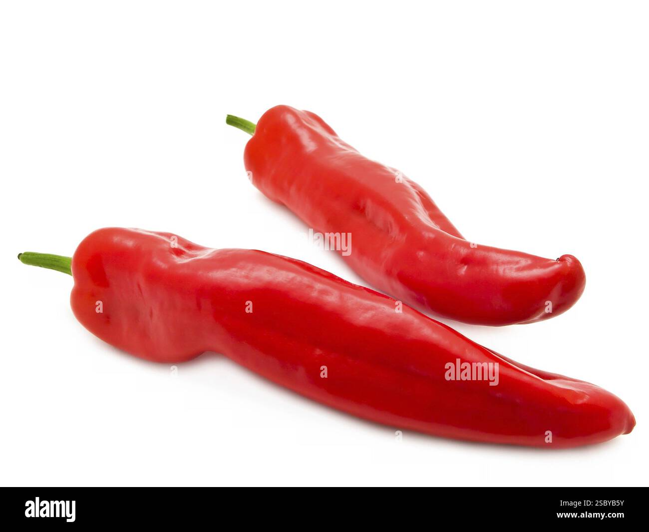 Two red peppers over the white background Stock Photo - Alamy
