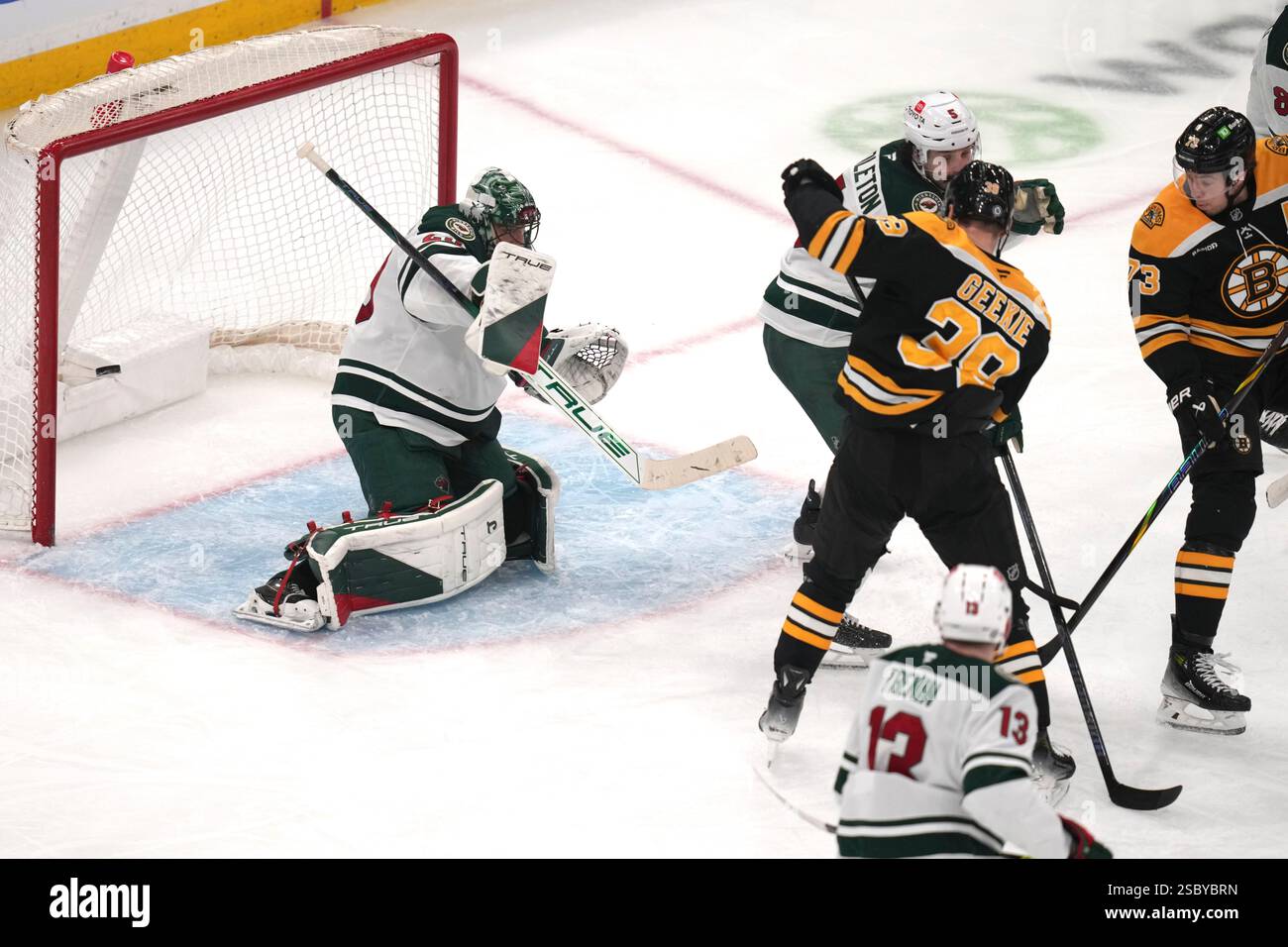 Boston Bruins defenseman Charlie McAvoy (73) scores on Minnesota Wild goaltender Marc-Andre ...