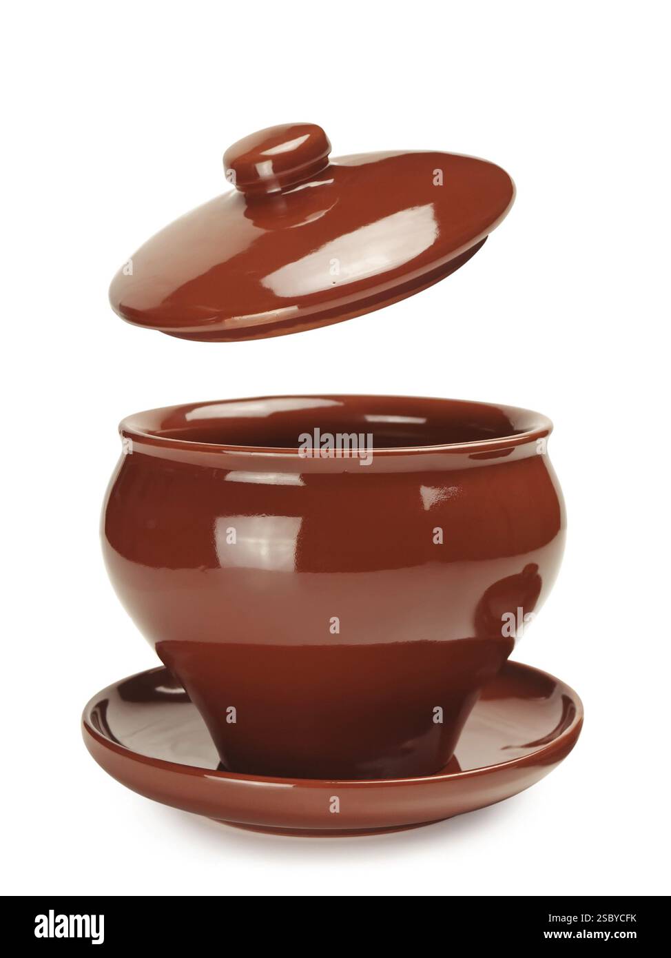 Brown ceramic pot over the white background Stock Photo - Alamy